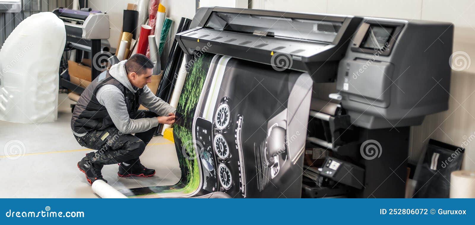 Technician Operator Works on Large Premium Industrial Printer Plotter ...
