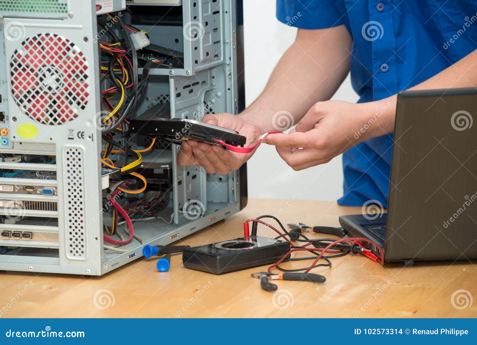 Technician Working on Broken Computer in His Office Stock Photo - Image ...