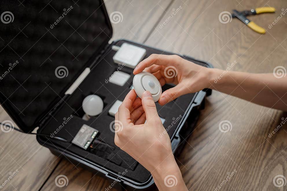 A Technician Works with a Demo Kit of the Smart Home System Stock Photo ...