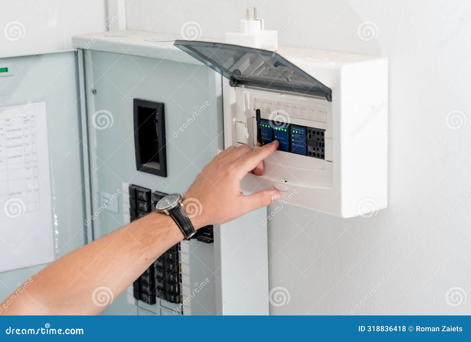 A Technician Works with a Demo Kit of the Smart Home System Stock Photo ...