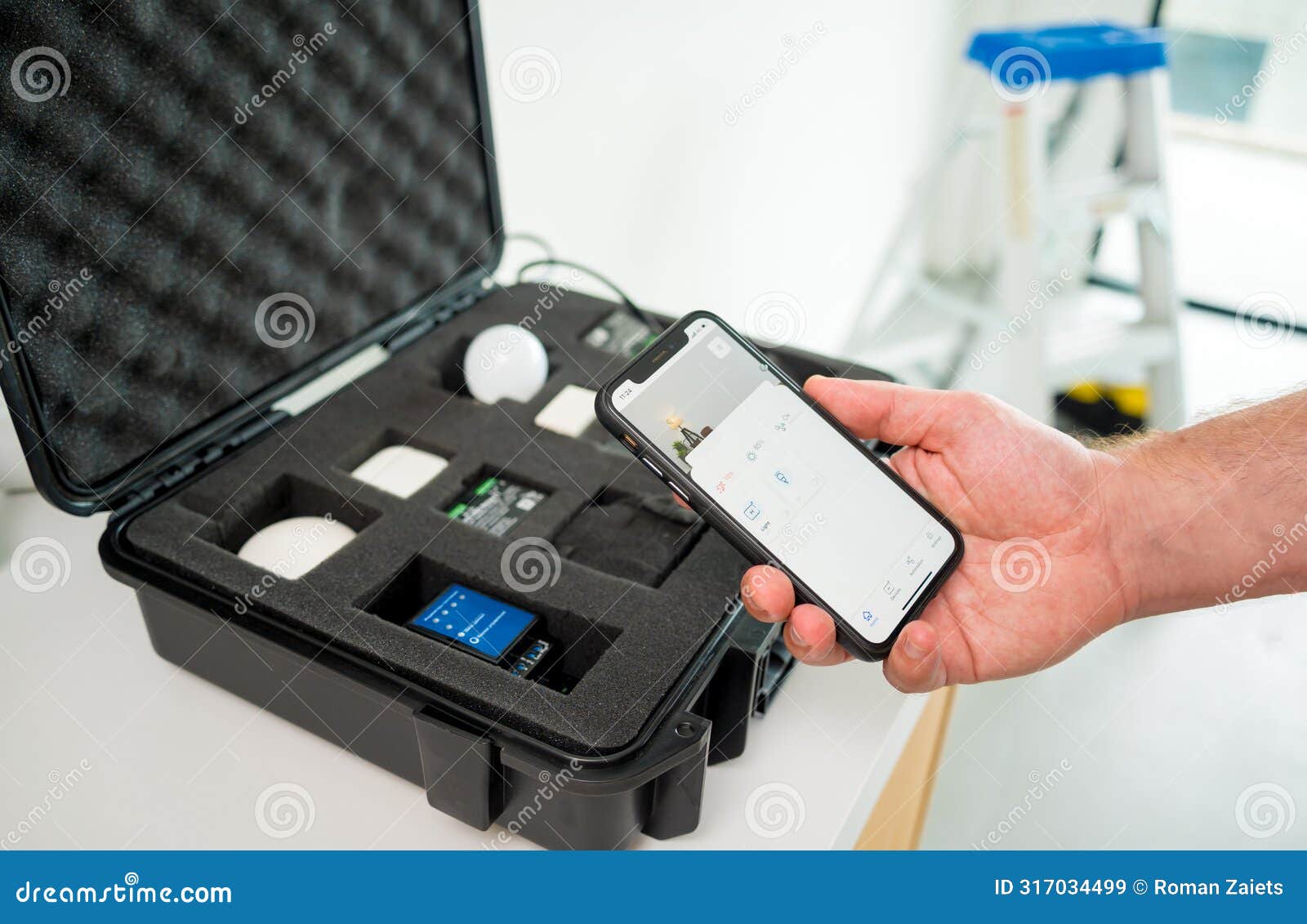 A Technician Works with a Demo Kit of the Smart Home System Stock Image ...