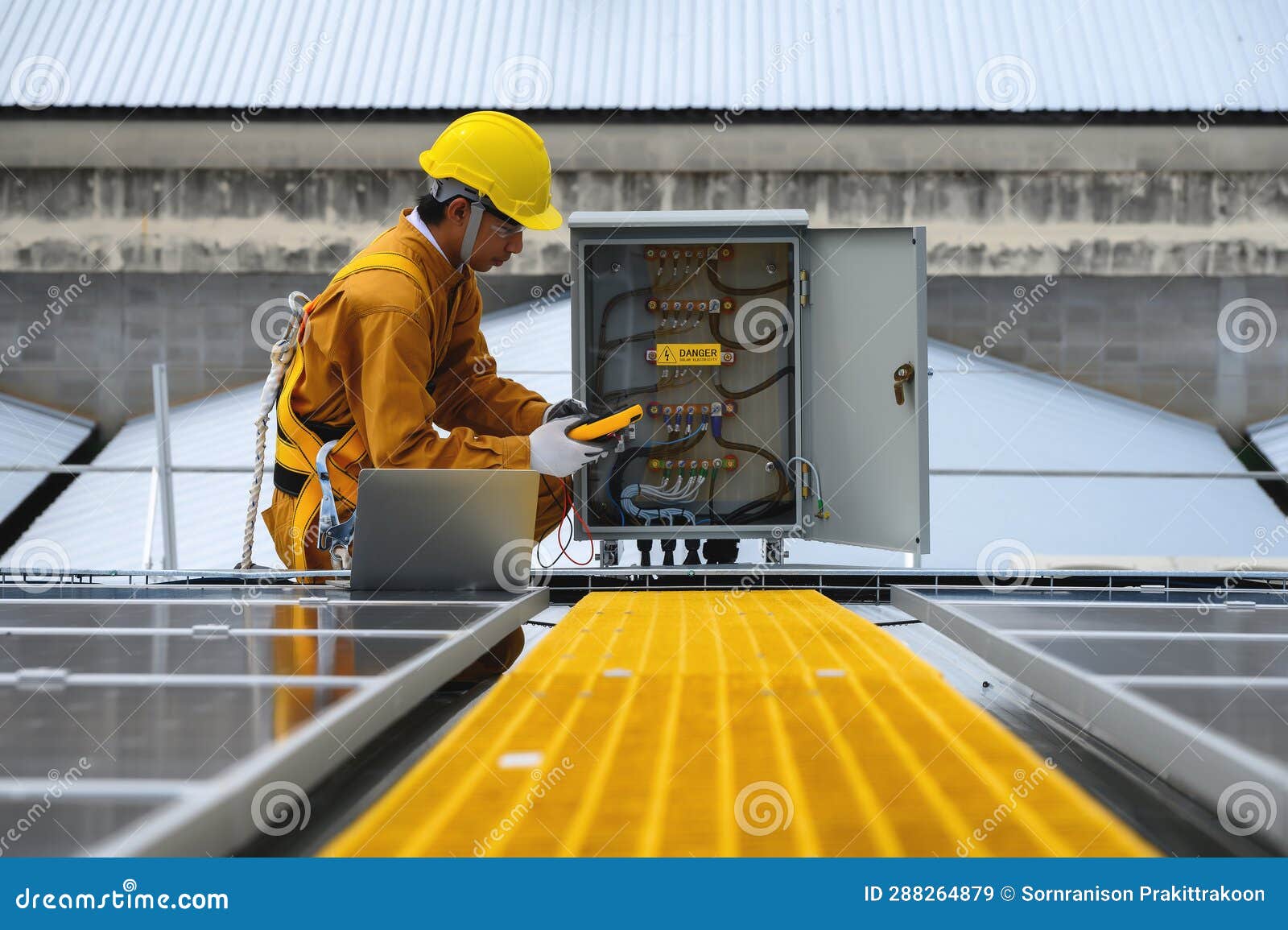 Technician Young Wearing Safety Protective Clothing and Safety Belt To ...