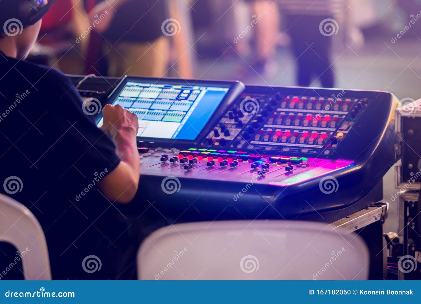 Technicians are Controlling the Sound System and Lighting System on the ...