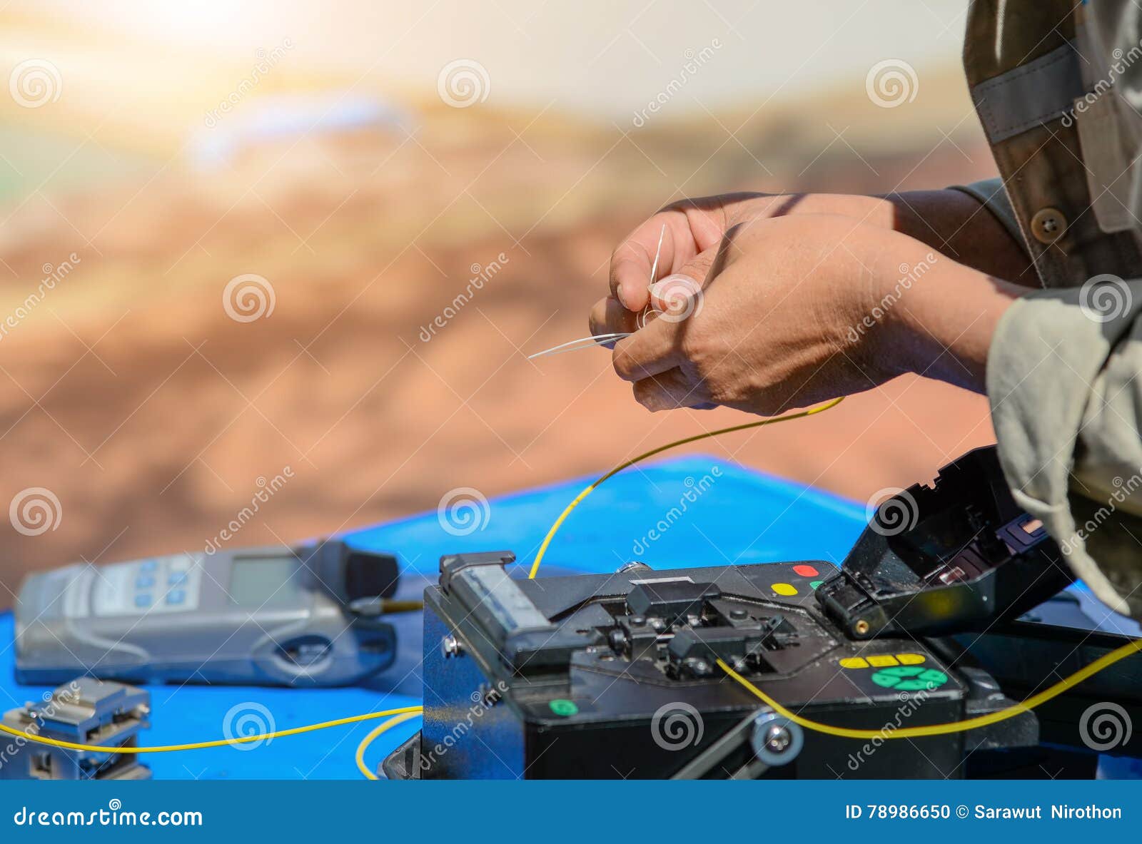 Technicians Cutting and Fusion Fiber Optic Cables. Stock Photo - Image ...