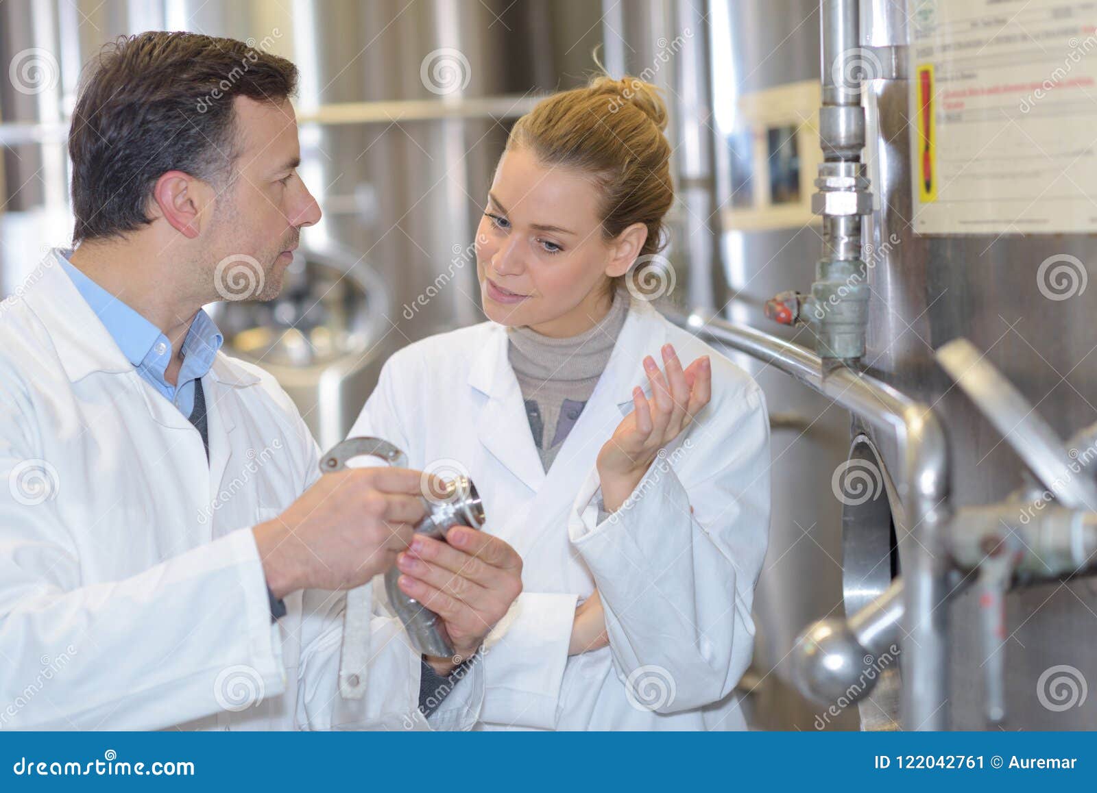 Technicians Discussing Industrial Part Stock Image - Image of threaded ...
