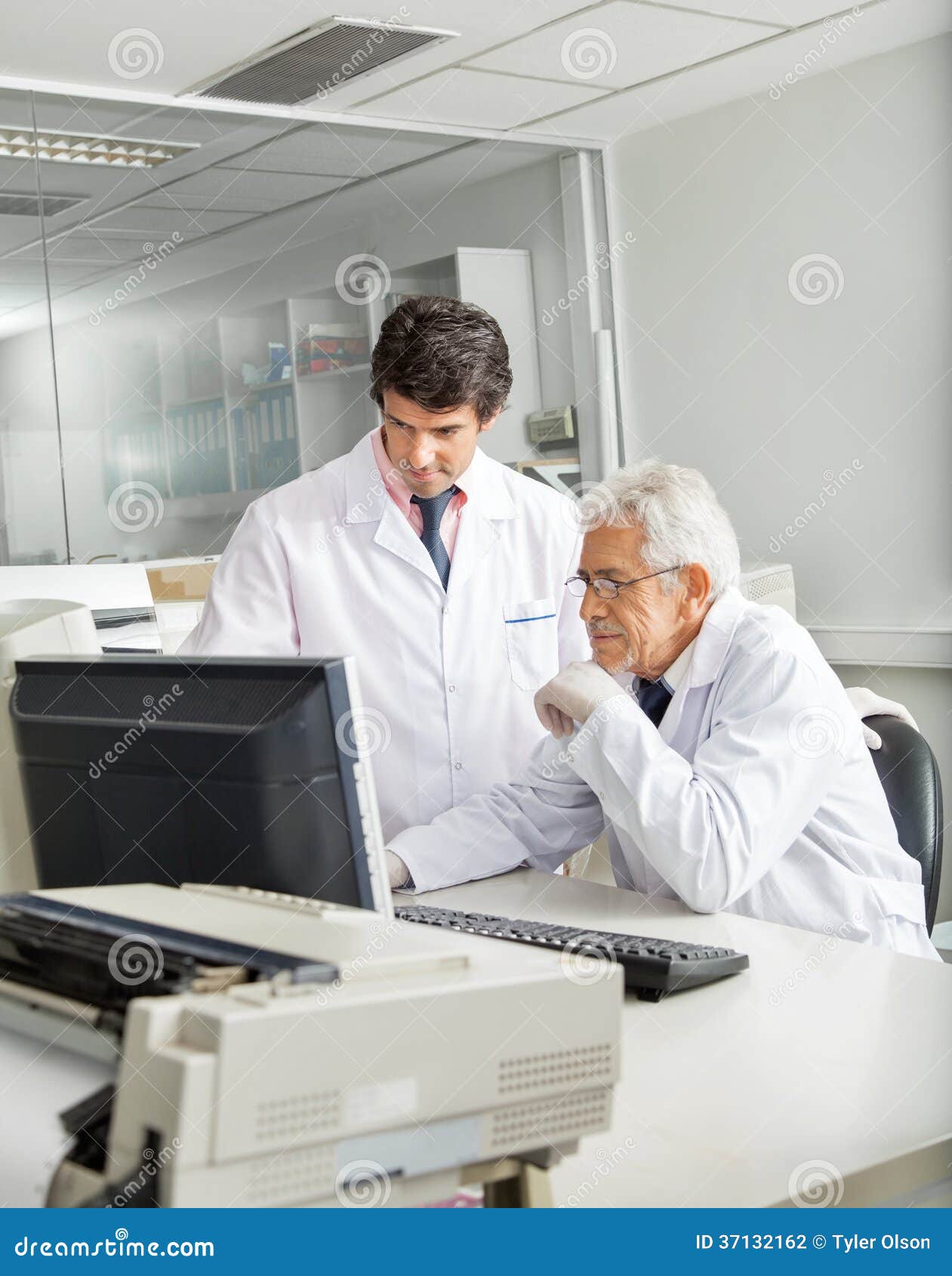 Technicians Discussing Over Computer Stock Photo - Image of analysis ...