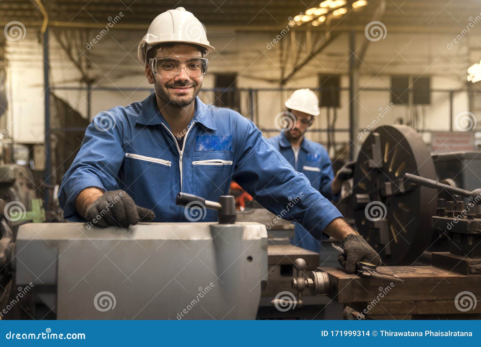 Technicians and Engineers are Working in a Factory with Modern Machines ...