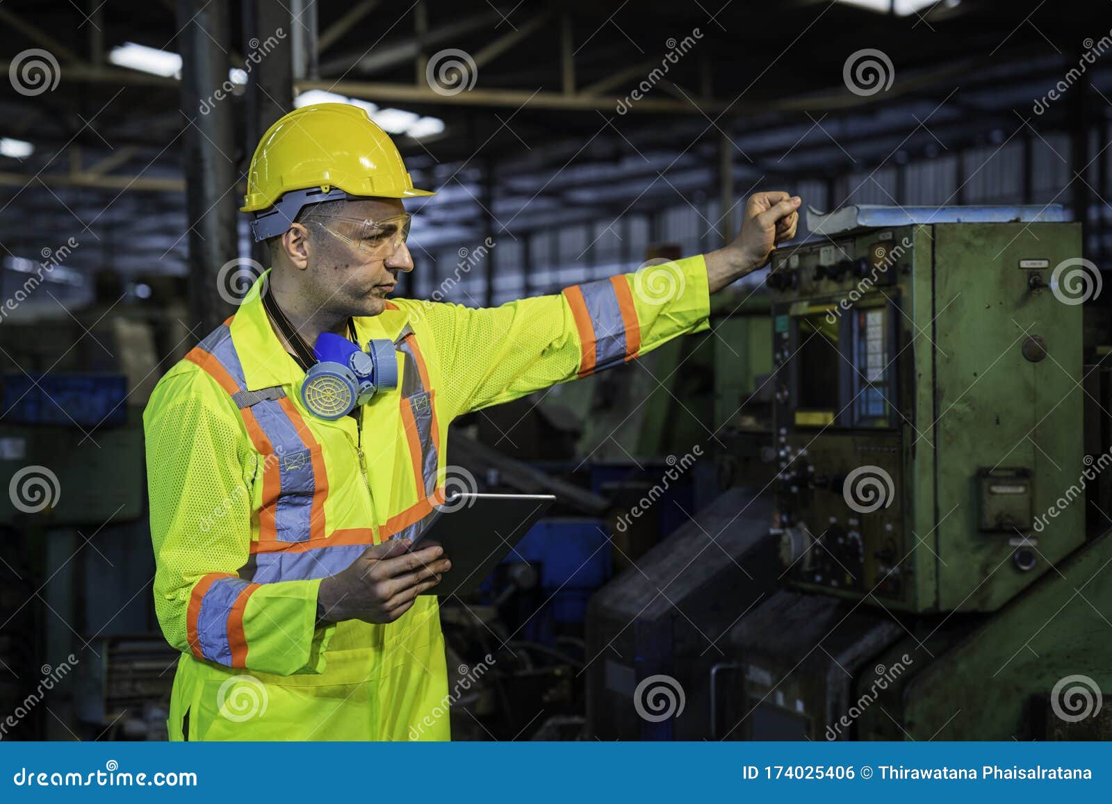 Technicians and Engineers are Working on Machines in a Factory ...