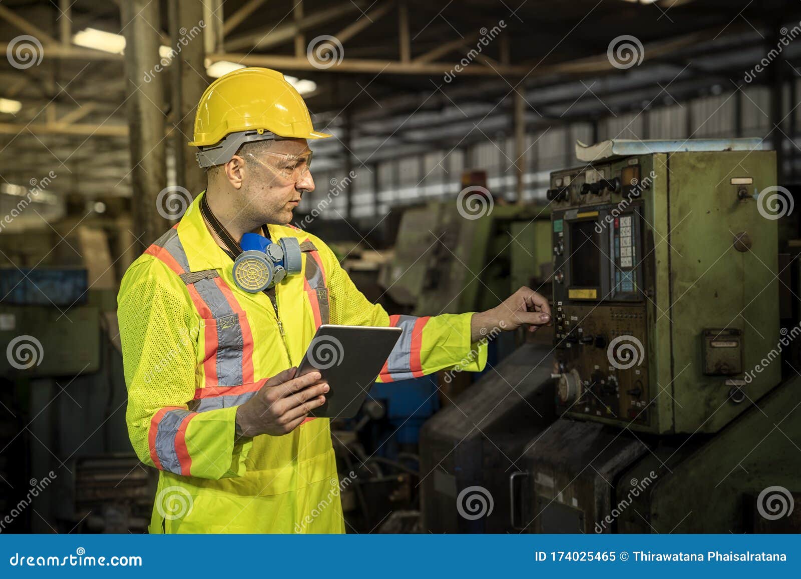 Technicians and Engineers are Working on Machines in a Factory ...