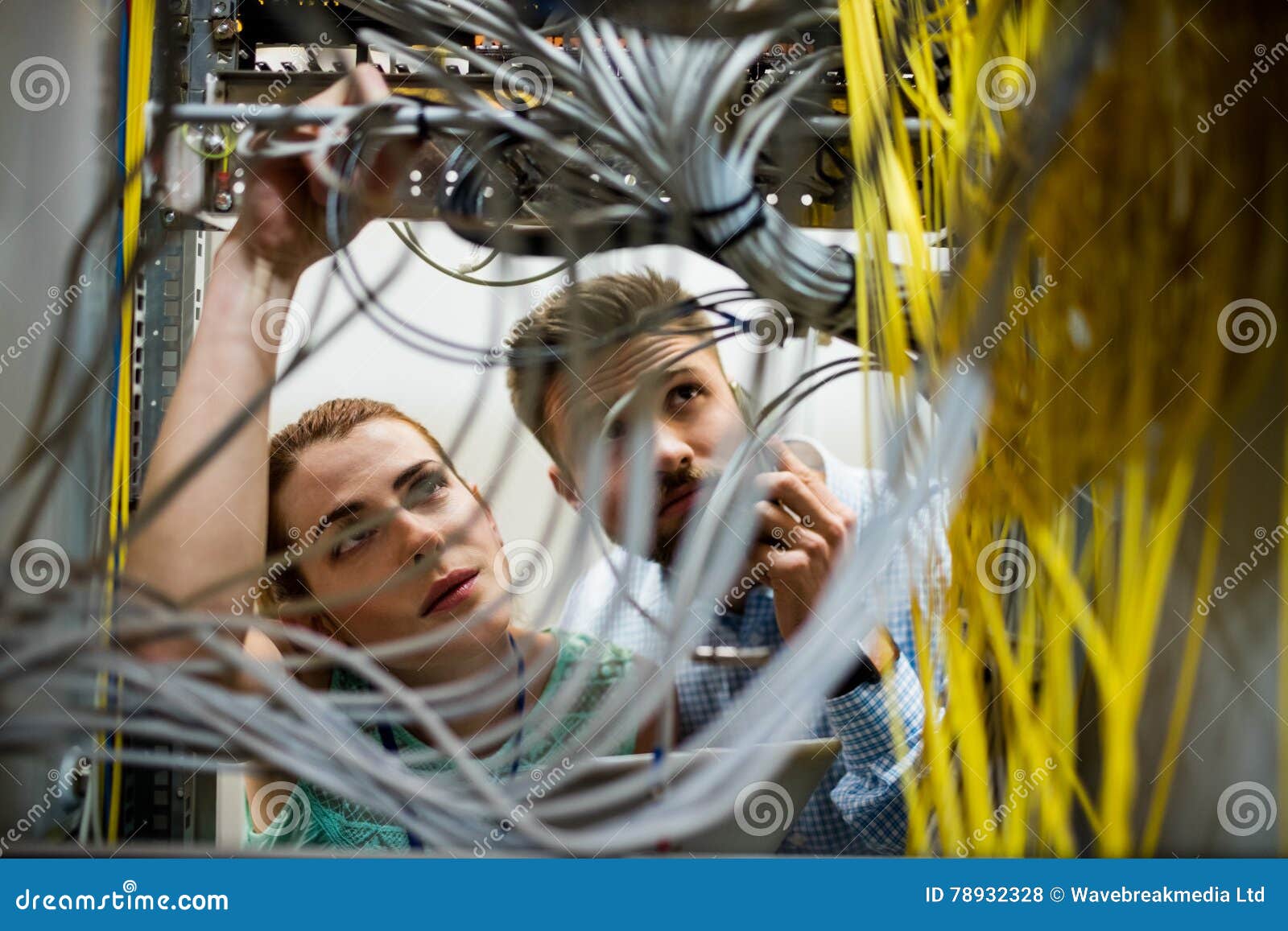 Technicians fixing cable stock photo. Image of formal - 78932328