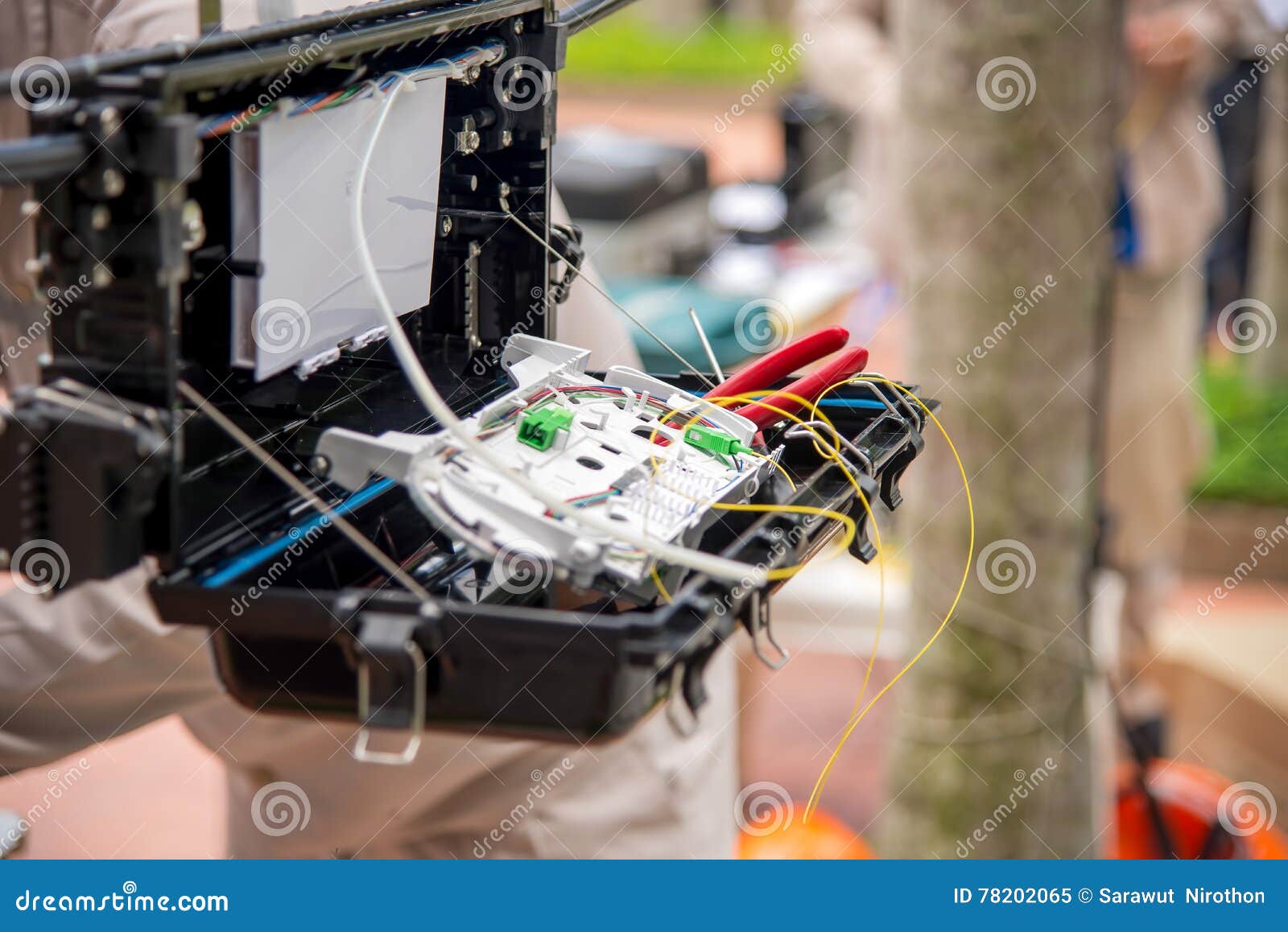 Technicians Install Cabinet on Fiber Optic Cable. Stock Image - Image ...
