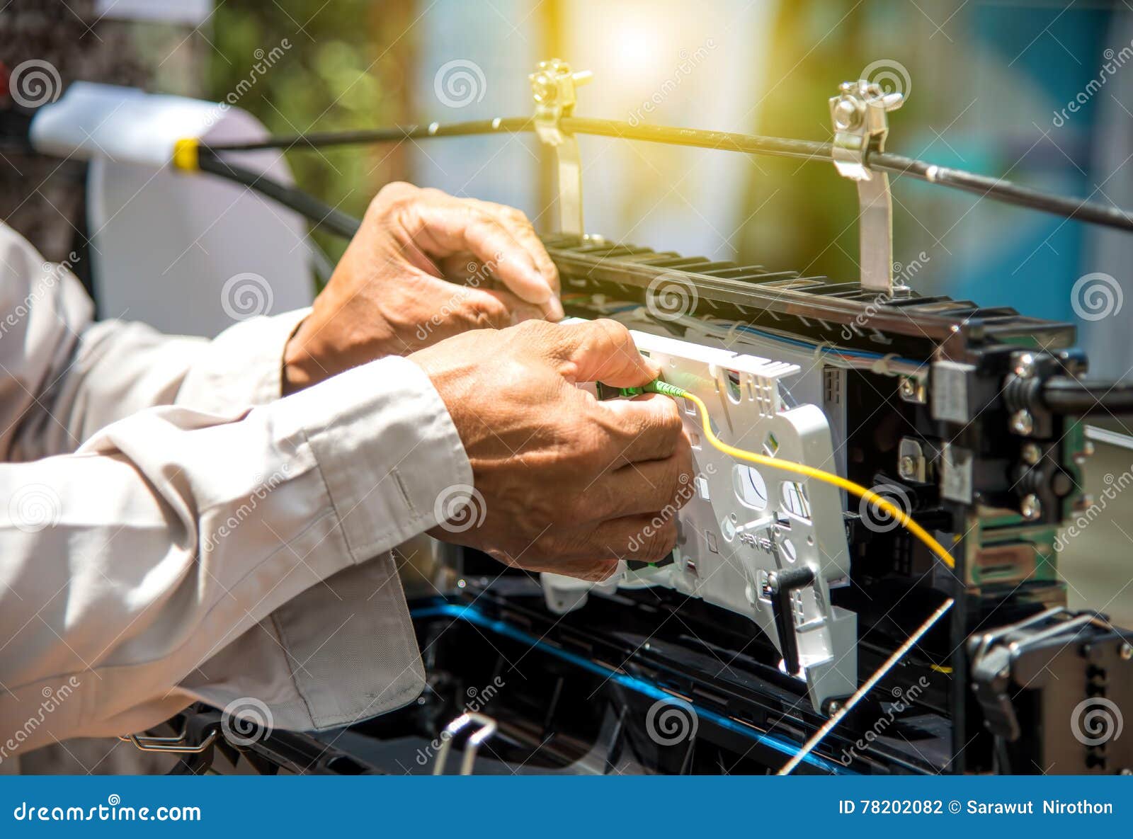 Technicians Install Cabinet on Fiber Optic Cable. Stock Photo - Image ...