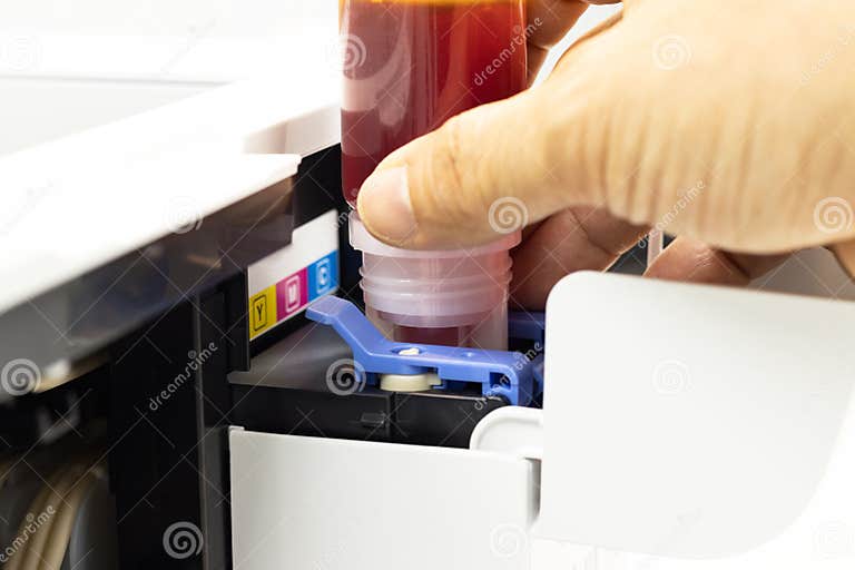 Technicians are Installing Setup the Ink and Insert Ink into the Fill ...