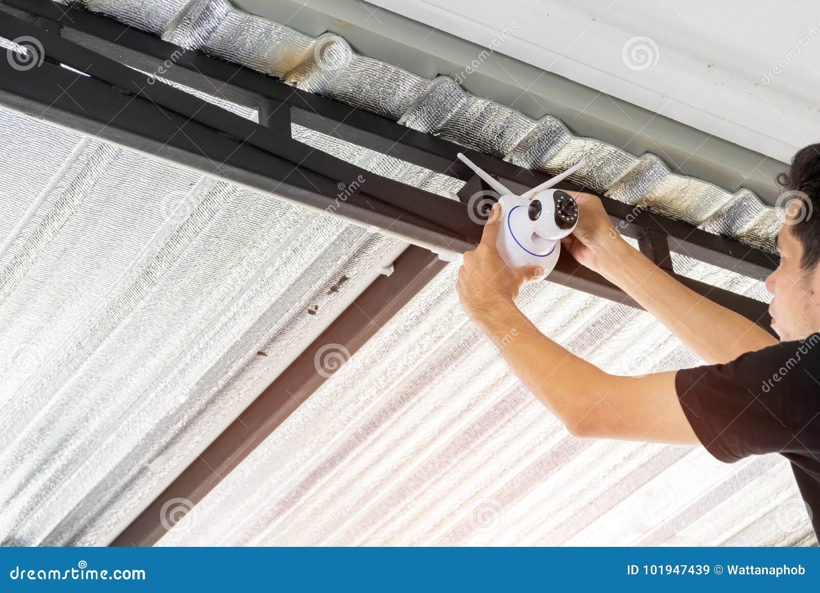 Black Man Installing Security Camera Photos - Free & Royalty-Free Stock ...