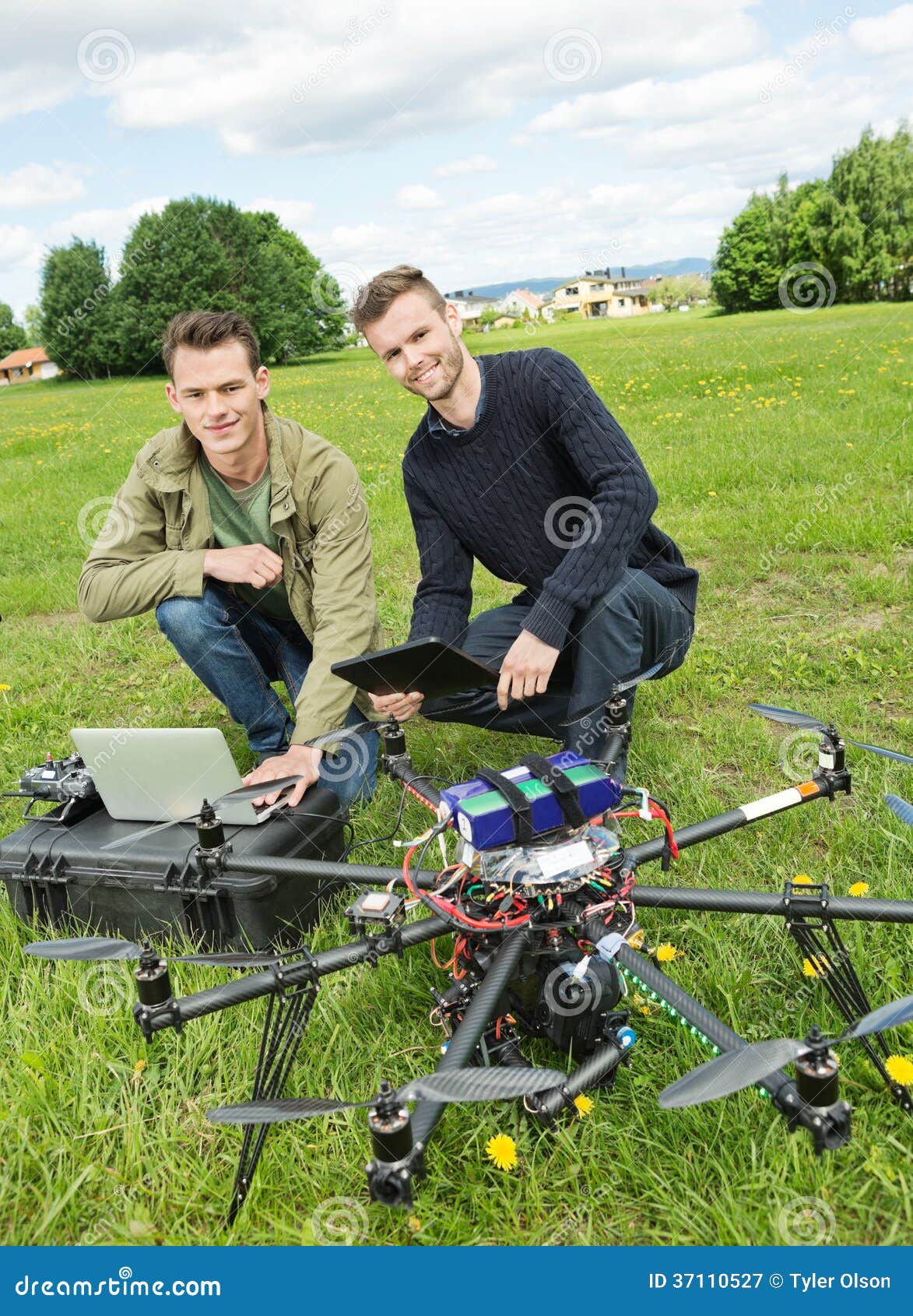 Technicians with Laptop and Digital Tablet by UAV Stock Image - Image ...