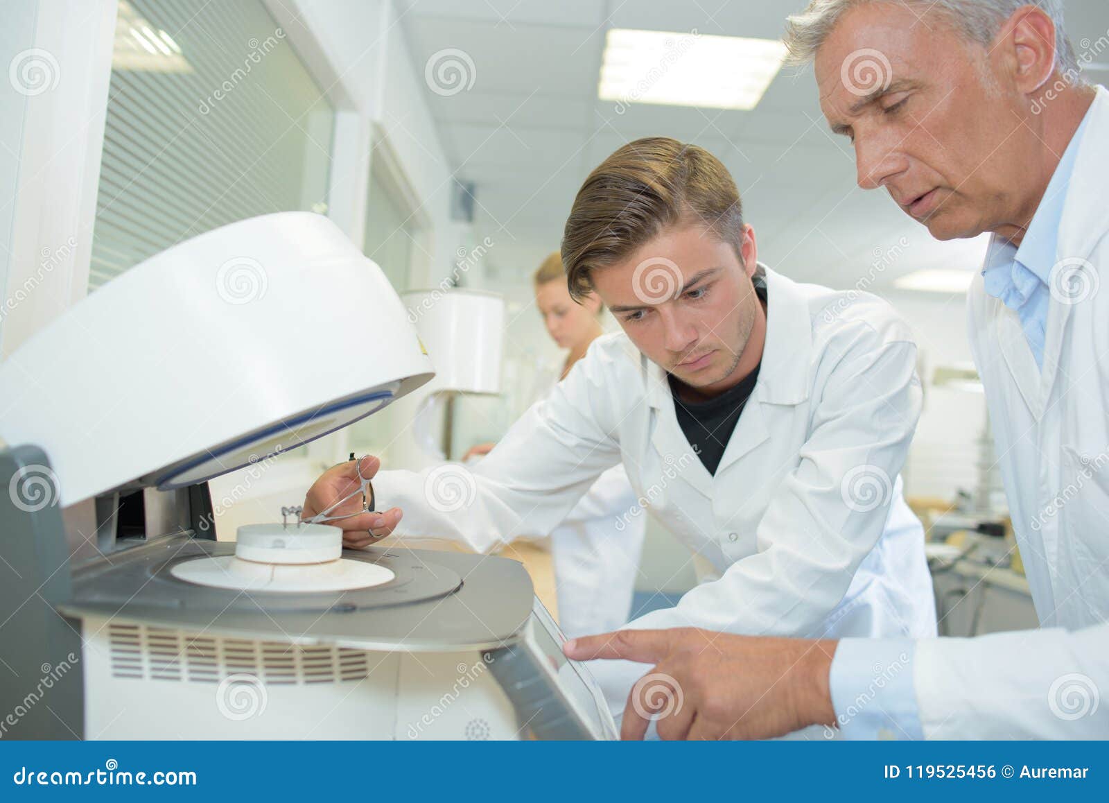 Technicians Looking at Machine Stock Photo - Image of training ...
