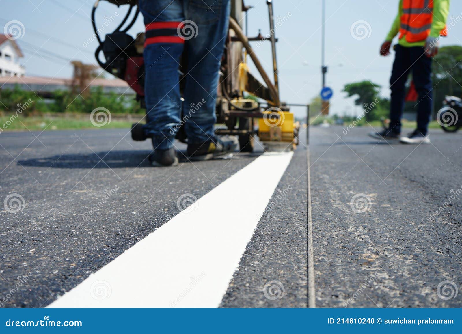 Technicians are Marking a Traffic Line on a Paved Road Stock Photo ...