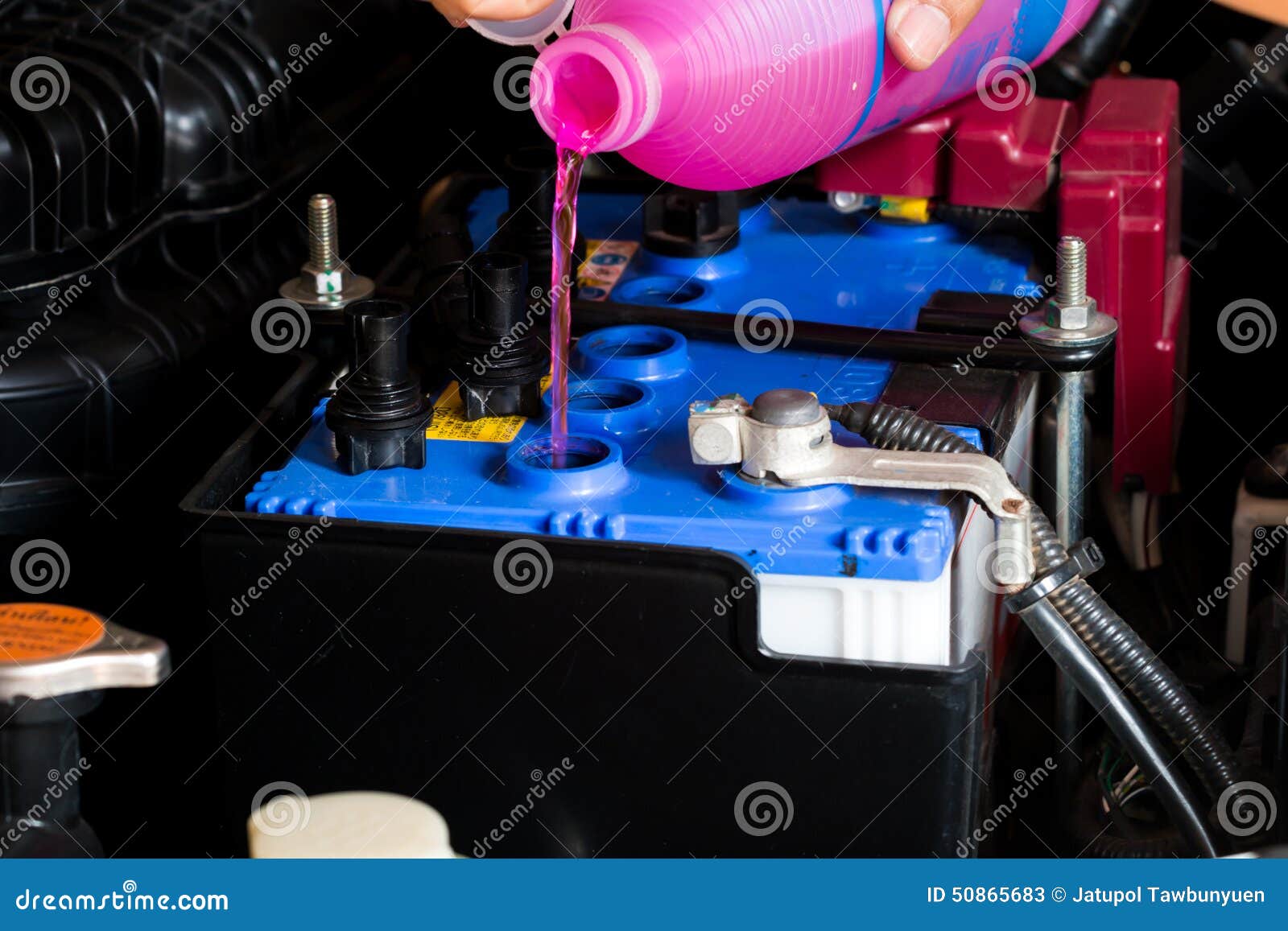 Technicians is Refill Fluid for the Battery Car Stock Image - Image of ...