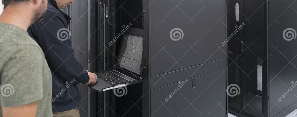 Technicians Team Updating Hardware Inspecting System Performance in ...