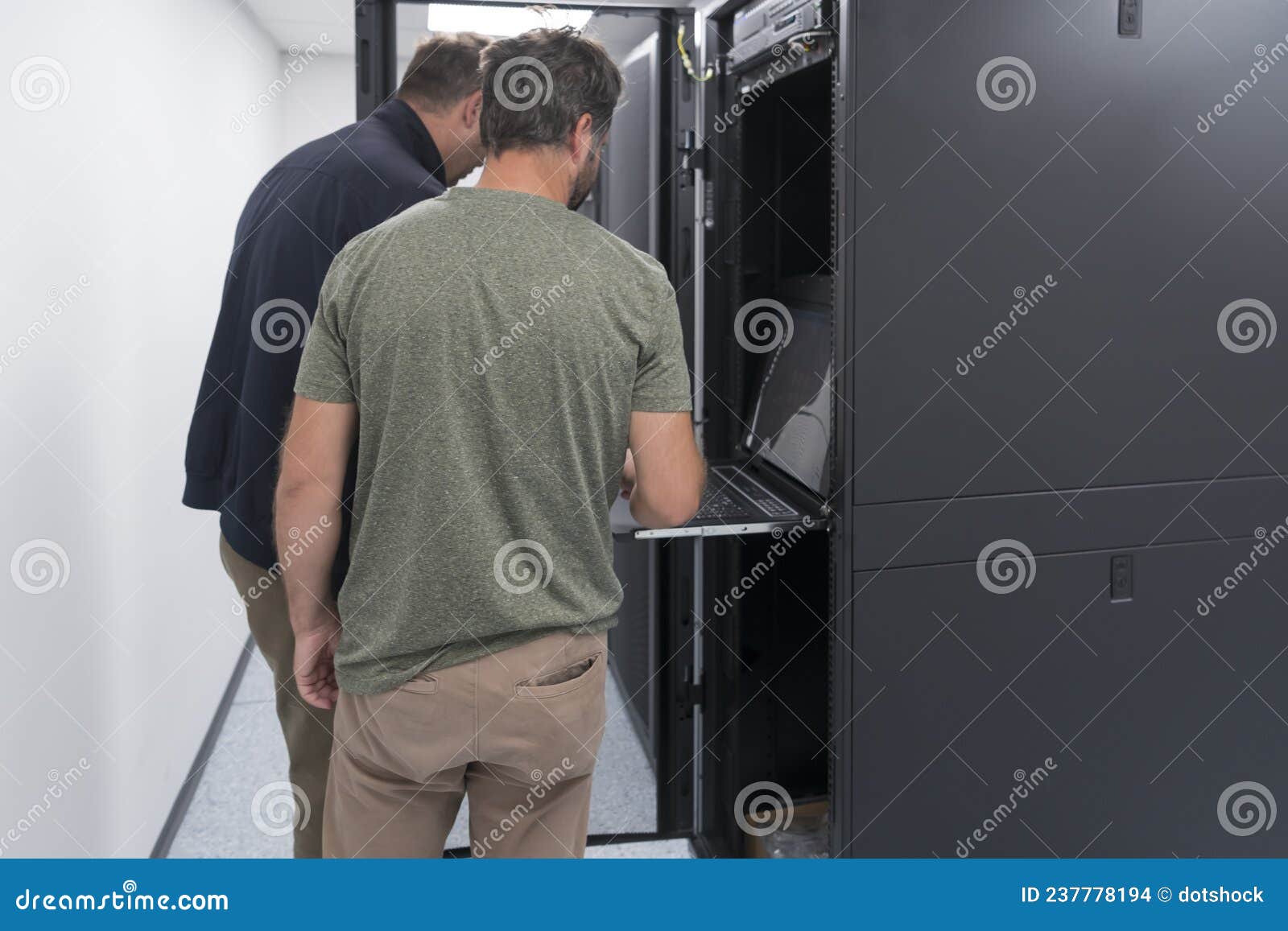 Technicians Team Updating Hardware Inspecting System Performance in ...