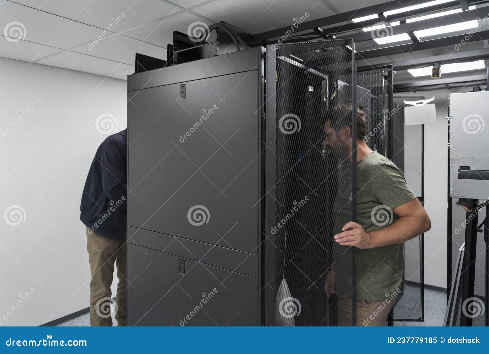 Technicians Team Updating Hardware Inspecting System Performance in ...