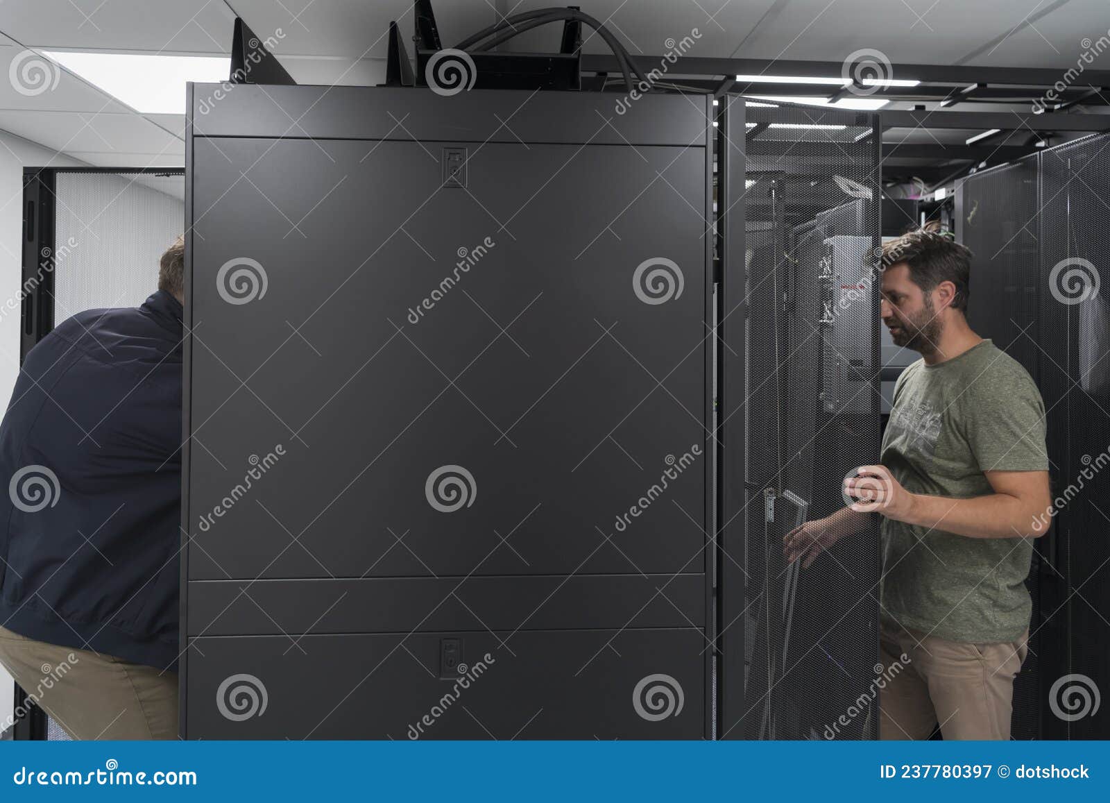 Technicians Team Updating Hardware Inspecting System Performance in ...