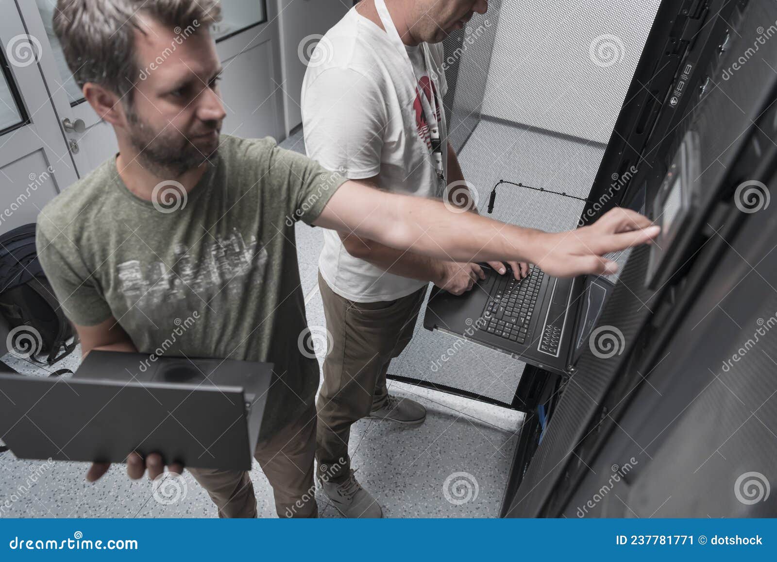 Technicians Team Updating Hardware Inspecting System Performance in ...