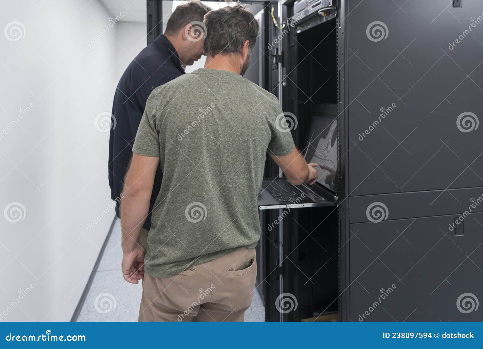 Technicians Team Updating Hardware Inspecting System Performance in ...