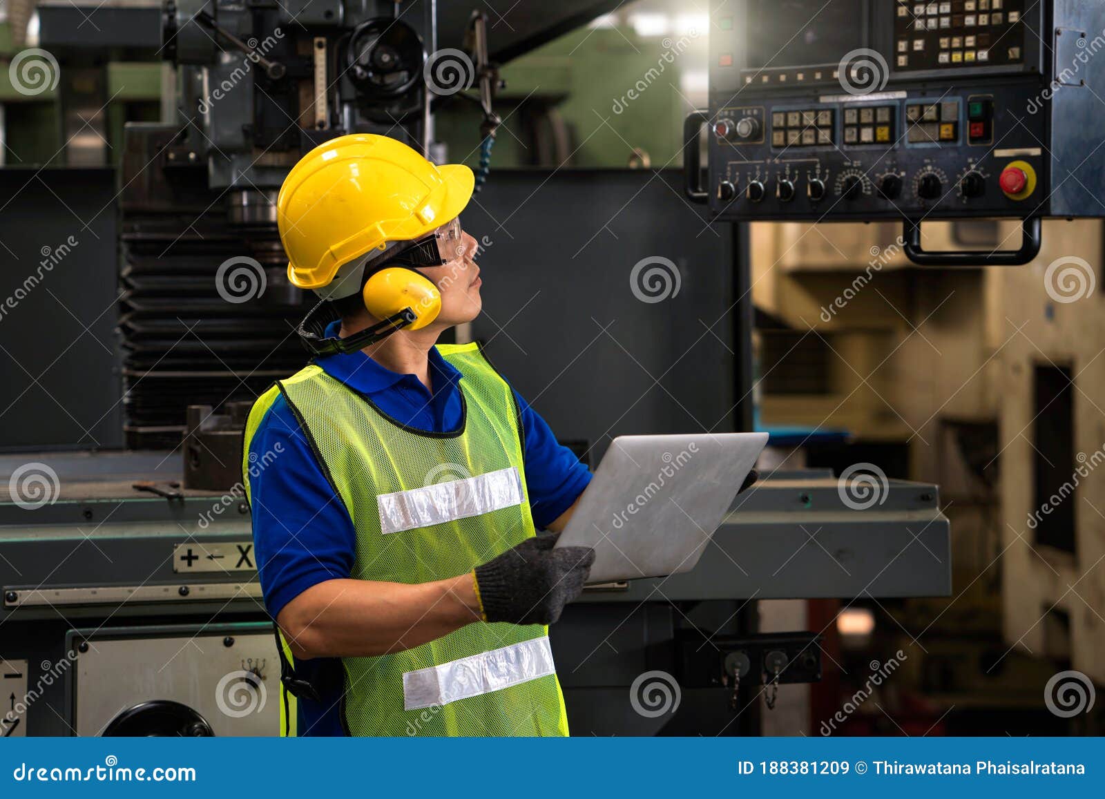 Technicians are Using Computers To Operate Industrial Machinery through ...