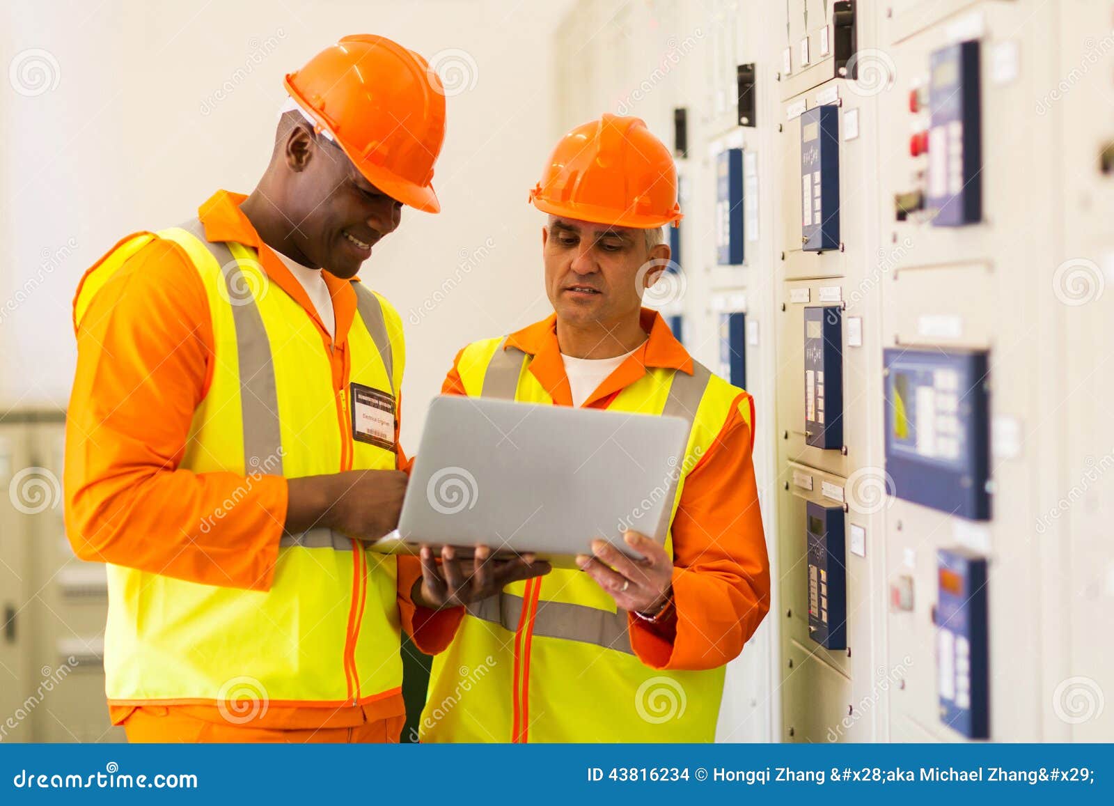 Technicians using laptop stock photo. Image of collar - 43816234