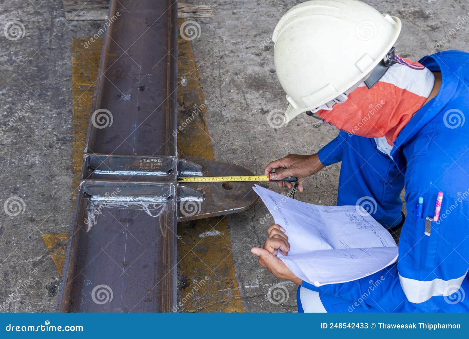 Technicians are Using a Measuring Tape To Check the Accuracy of the ...