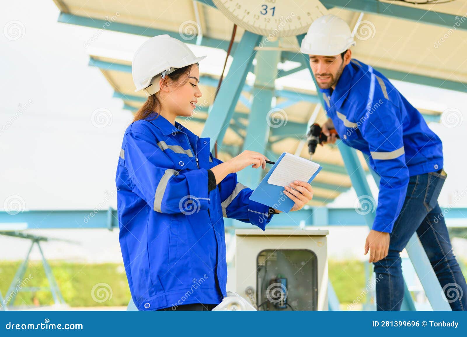 Technicians Workers Installing Solar Panels at Solar Cell Farm Stock ...