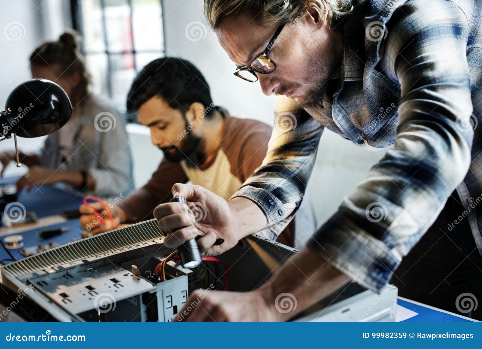 Technicians Working on Computer Electronics Parts Stock Image - Image ...