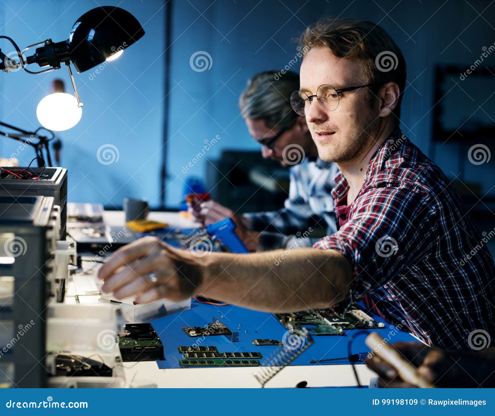 Technicians Working on Electronics Parts Stock Image - Image of ...