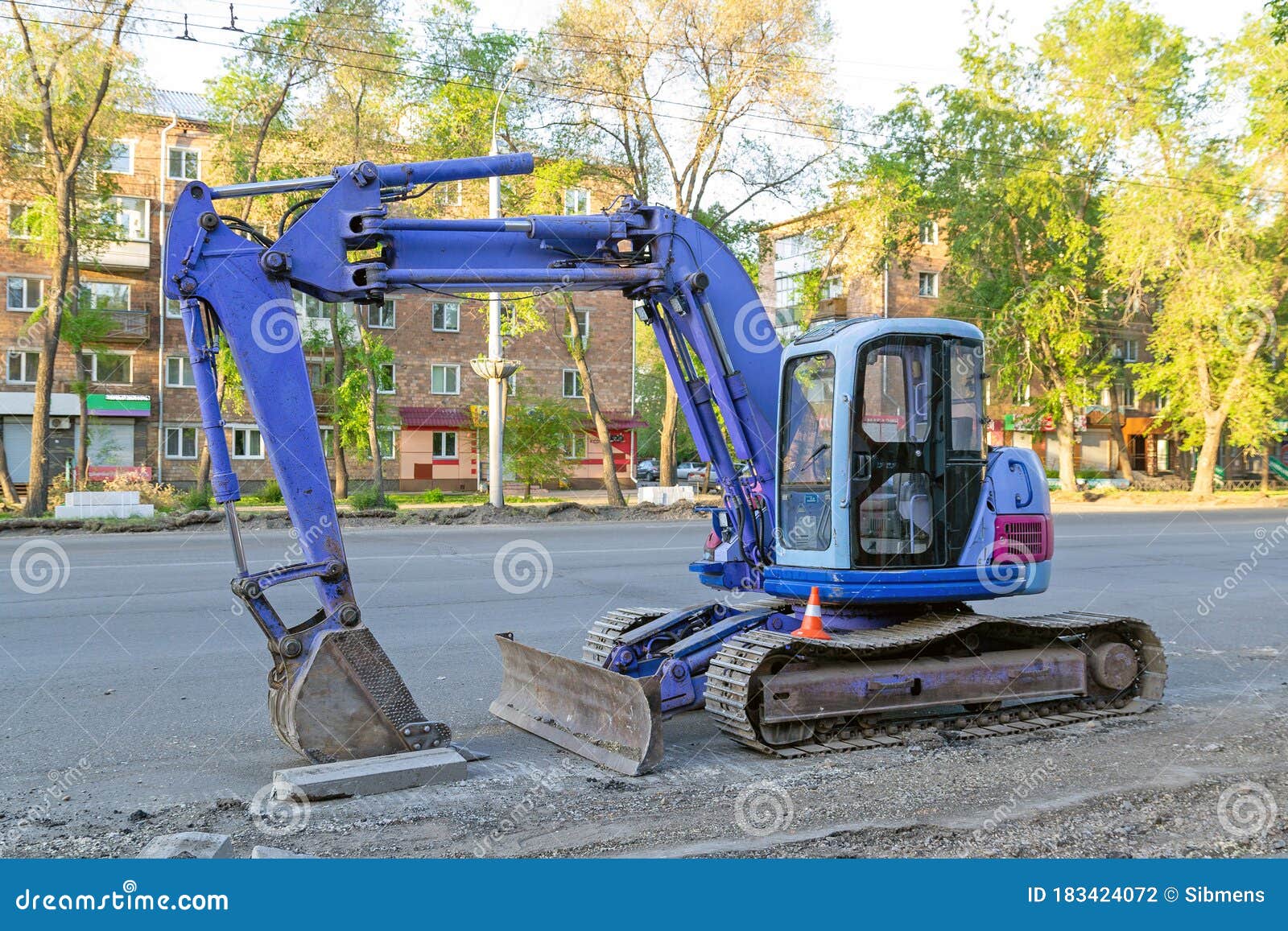 Technique for the Repair of Roads. Small Crawler Excavator Editorial ...