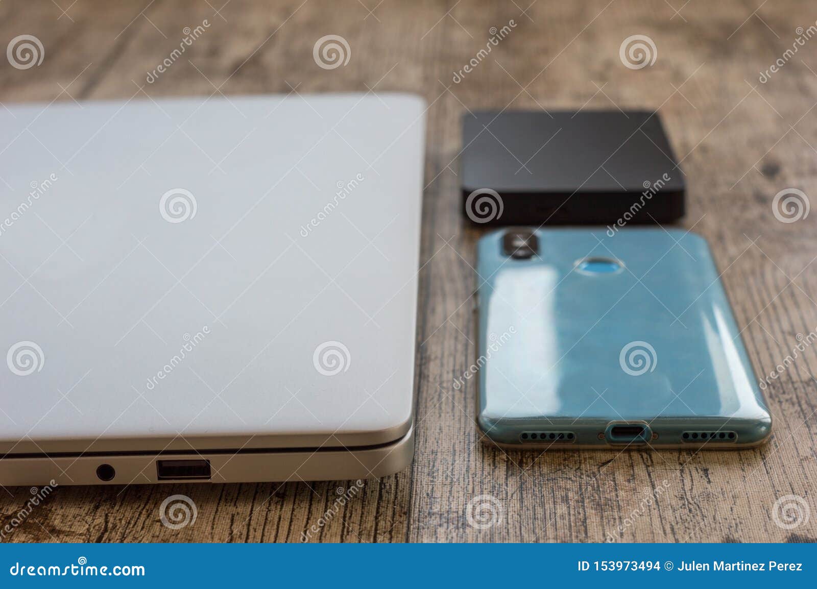 Technological Objects in a Table Stock Photo - Image of phone, laptop ...