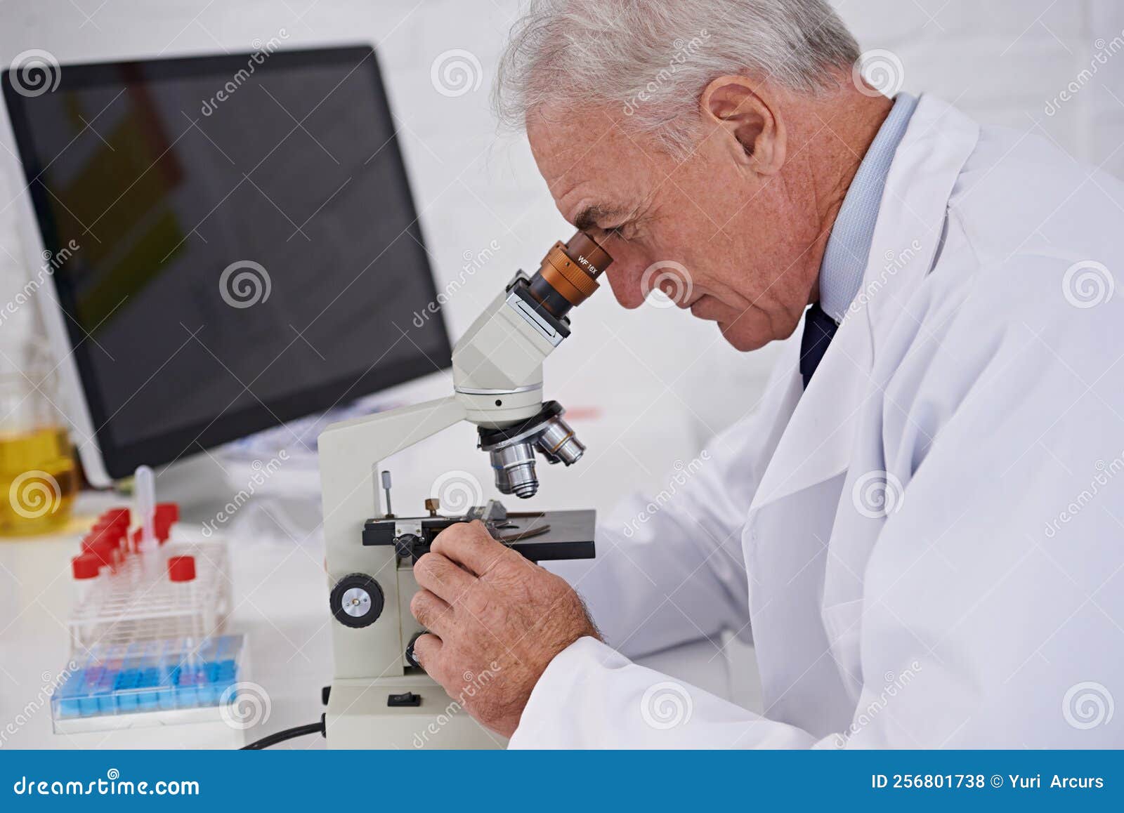 Technology Aiding the Advancement of Science. a Mature Scientist Using ...