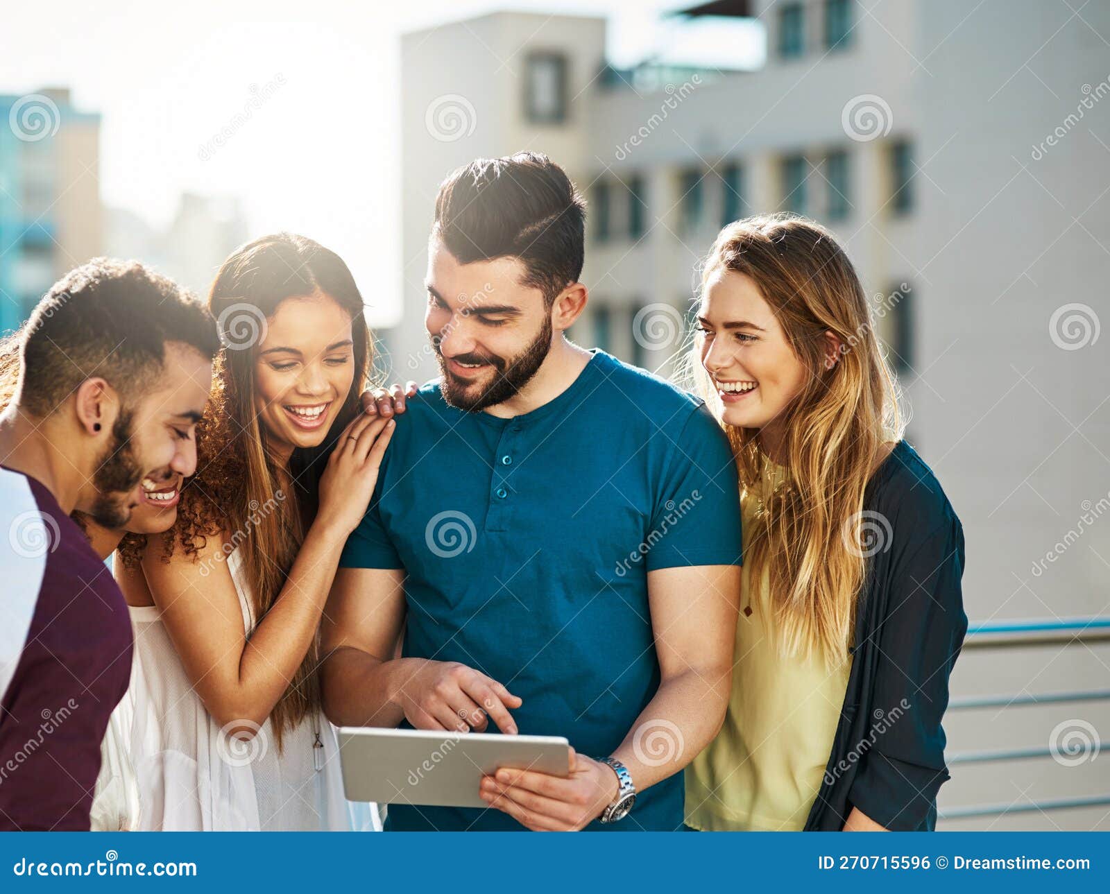 Technology Can Be Enjoyed Together. Shot of Young Friends Using a ...