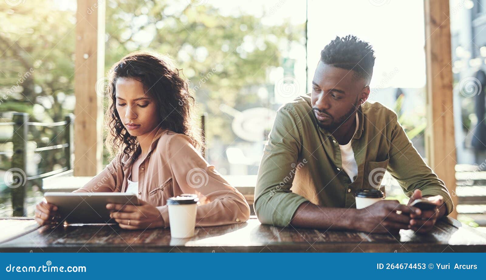 Technology is Coming between Them. Two Young People Using Their ...