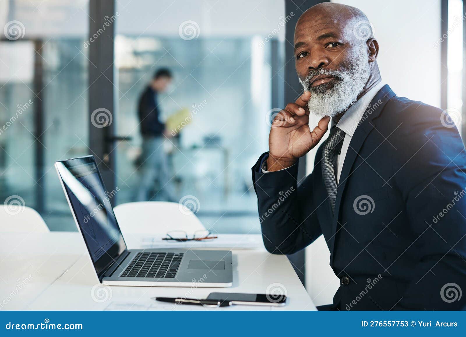 Technology Cuts My Workday in Half. a Mature Businessman Working in a ...