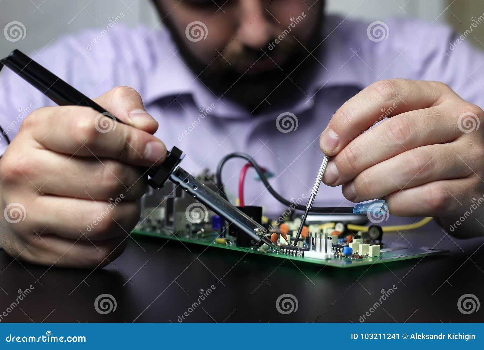 Chip soldering man hands stock image. Image of electrical - 103211241