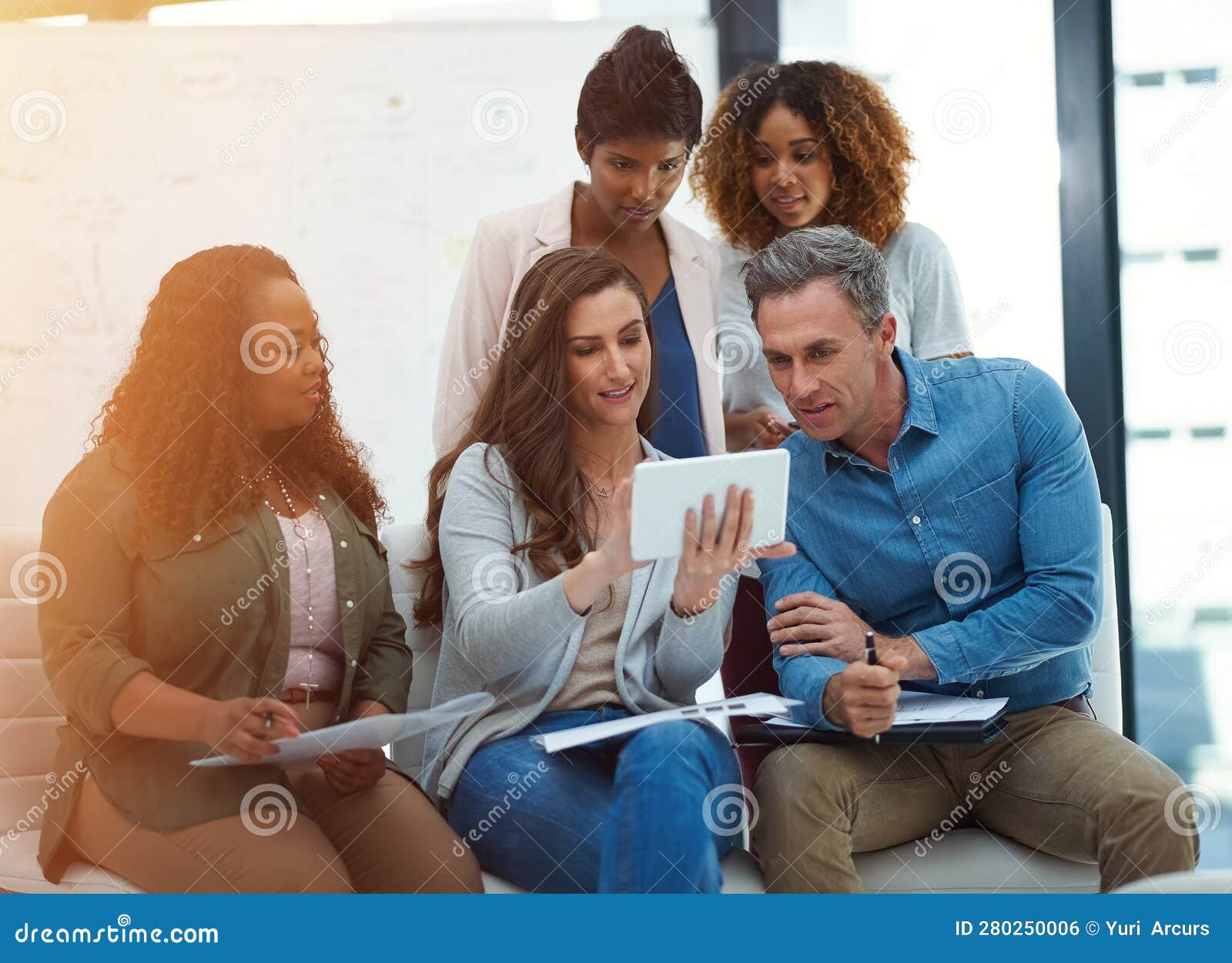 Technology Gives Their Team the Competitive Edge. a Creative Team Using ...