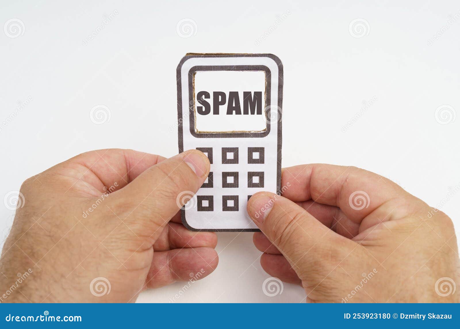 In the Hands of a Person is a Cardboard Model of a Telephone with an ...