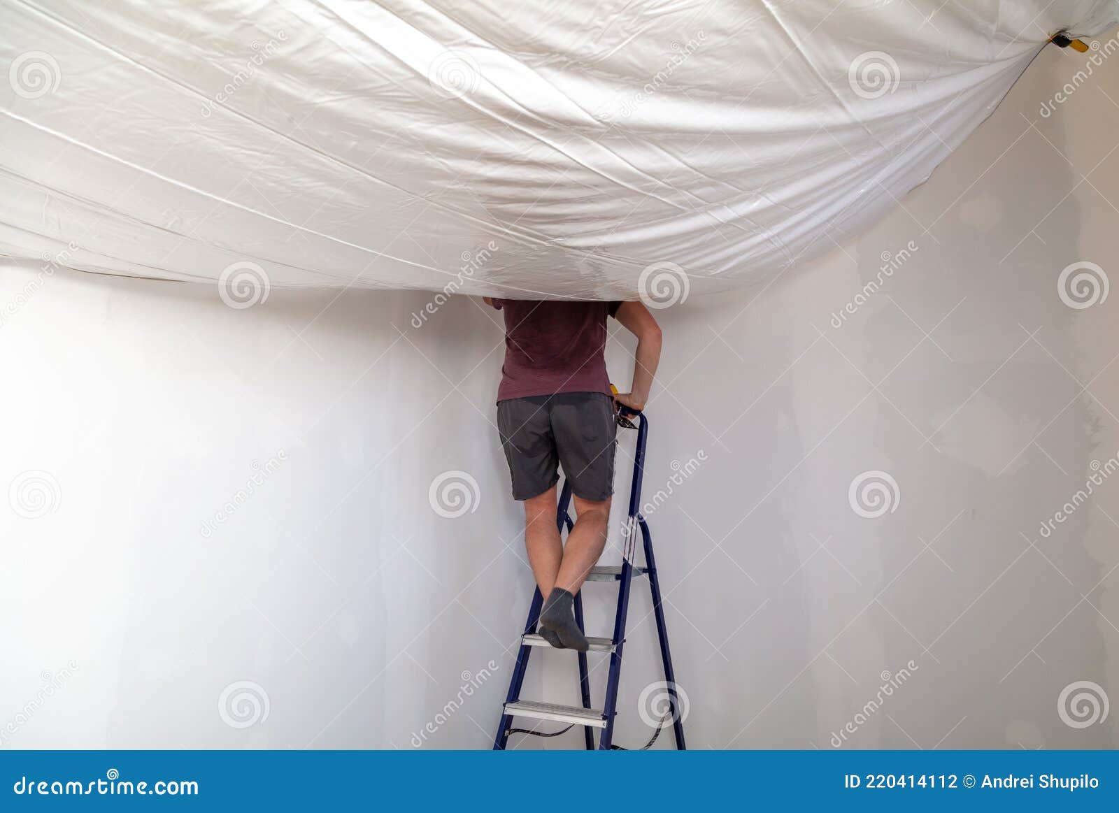 The Technology of Stretching the Stretch Ceiling in the Room. Stock ...