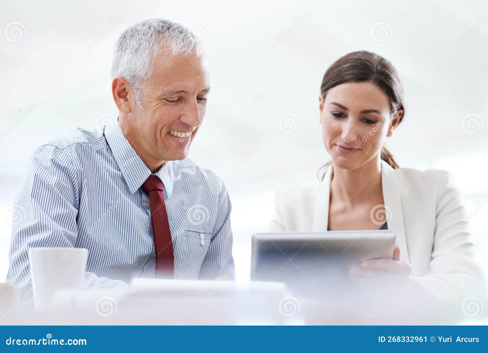 Technology Supporting Business Processes. Two Coworkers Using a Digital ...