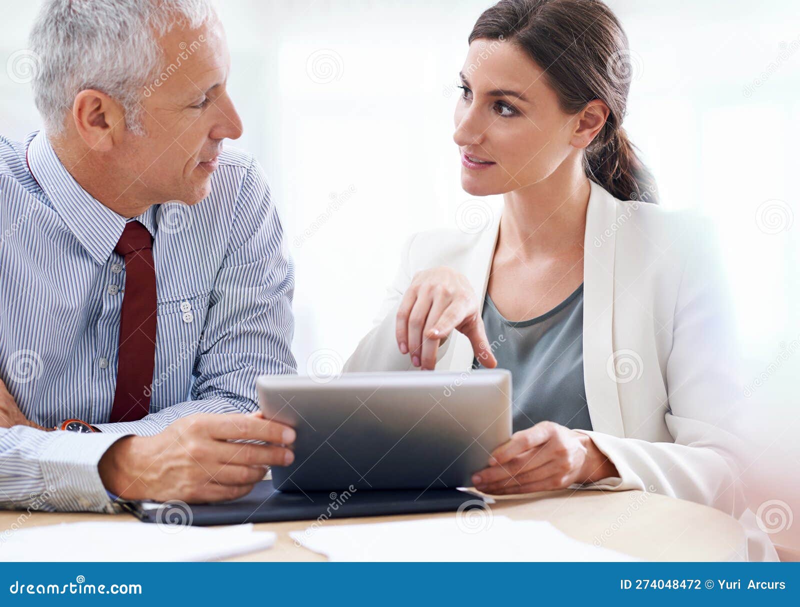 Technology Supporting Business Processes. Two Coworkers Using a Digital ...