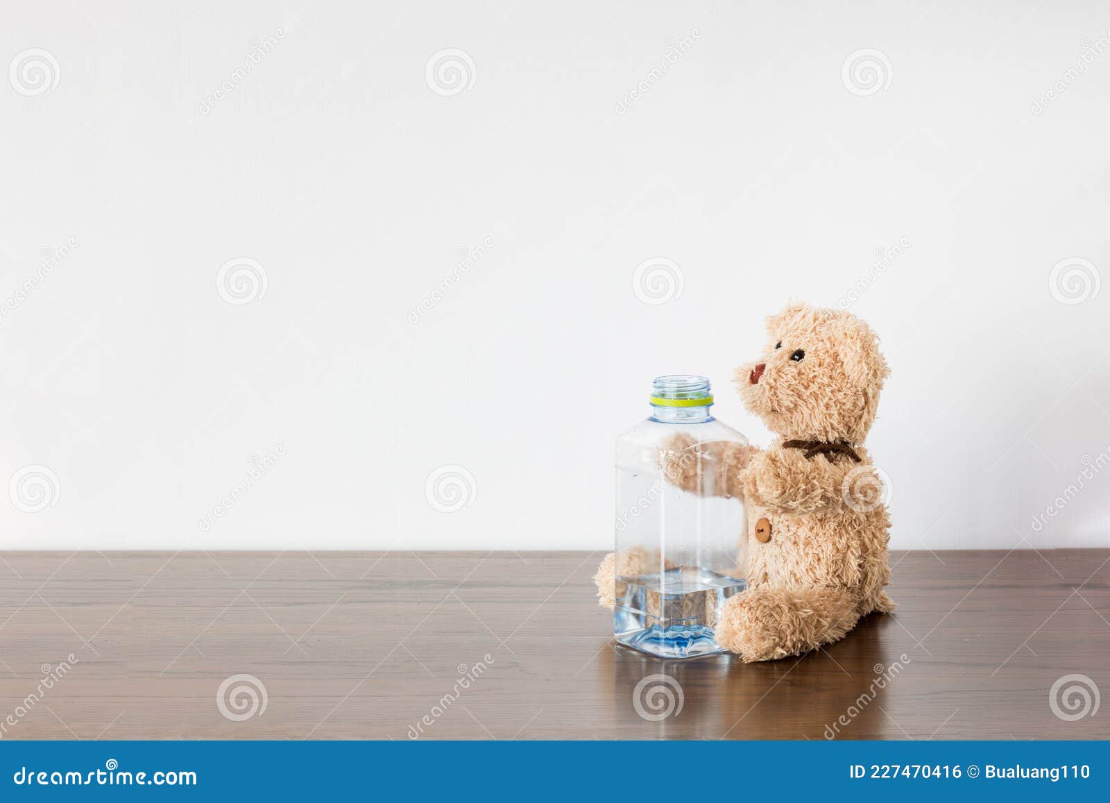 Teddy Bear is Drinking Water Stock Photo - Image of innocence, fluffy ...