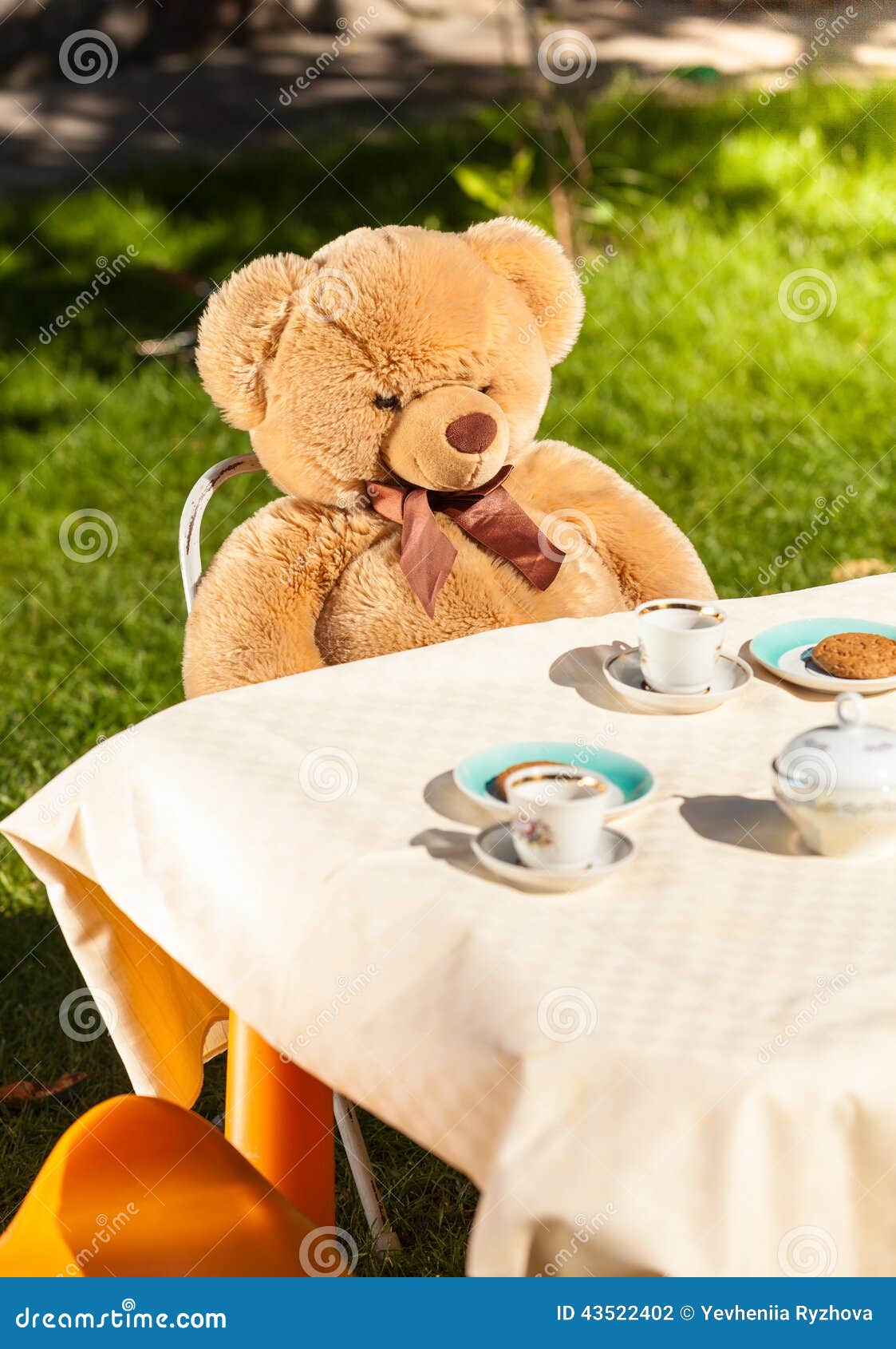 Teddy Bear Sitting Behind Table and Drinking Tea Stock Photo - Image of ...