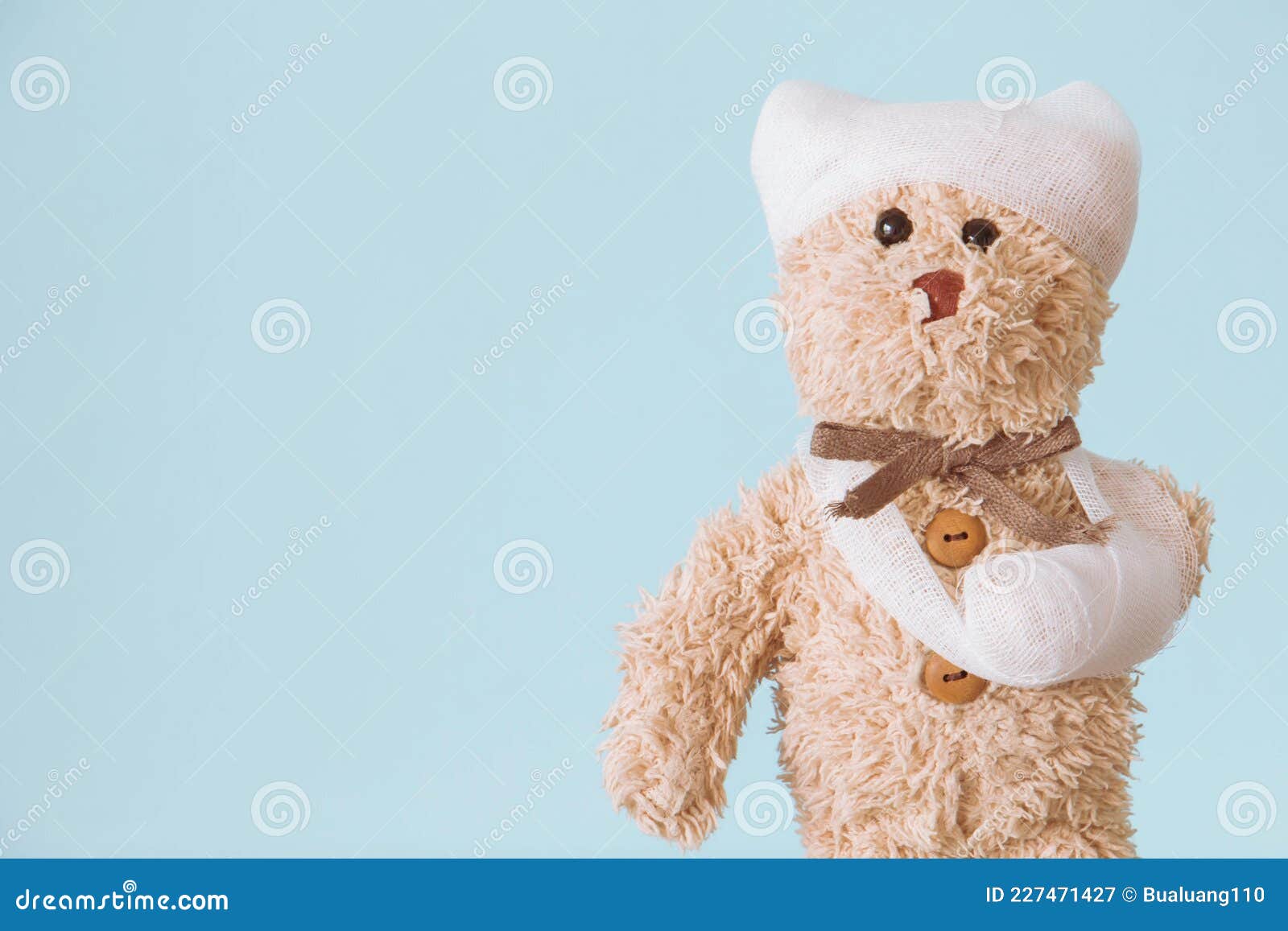 Teddy Bear with the Trauma of the Head and Arm. Stock Image - Image of ...
