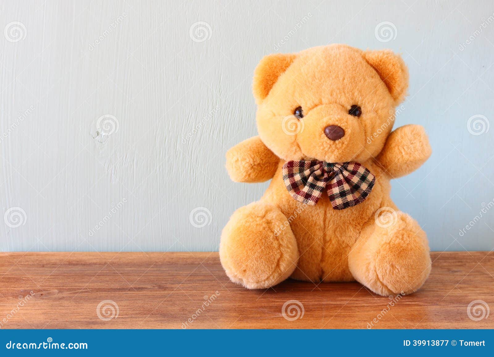 Teddy bear on wooden table stock image. Image of concept - 39913877